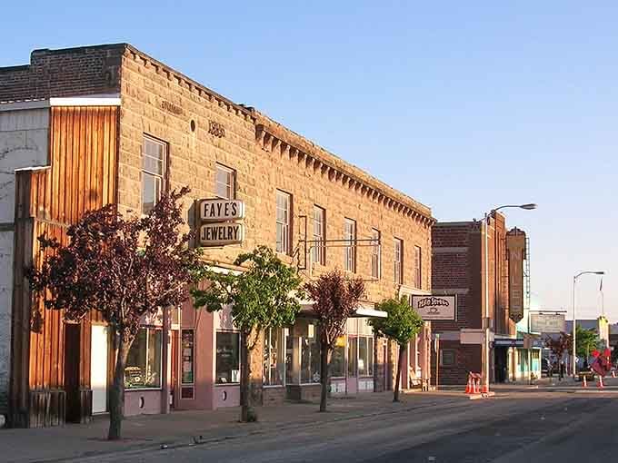 Main Street's historic storefronts glow in golden light, reminding you that beauty exists even in California's most remote places.
