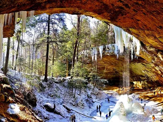 Icicles frame the winter cave like nature's own chandelier, creating Instagram-worthy scenes without any filter needed whatsoever.