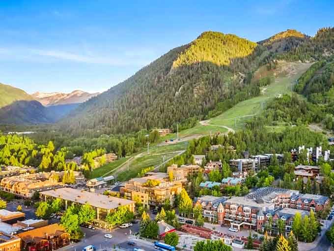 Aerial views reveal how Aspen nestles into the valley, surrounded by peaks that define this mountain paradise.