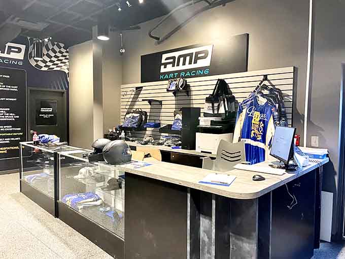 The pro shop counter displays racing gear and memorabilia, tempting visitors to look the part of serious speed enthusiasts.