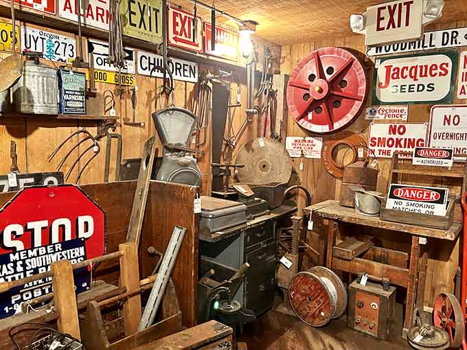 Farm tools and industrial relics share space with colorful signage, proving that organized chaos can be absolutely beautiful when done right.