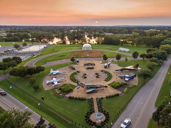From above, the park's circular layout resembles a compass rose guiding visitors through American military aviation heritage.