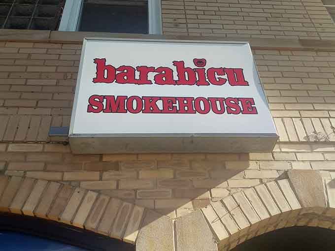 The sign that marks your destination, a beacon calling all who seek genuine smoked meat perfection.