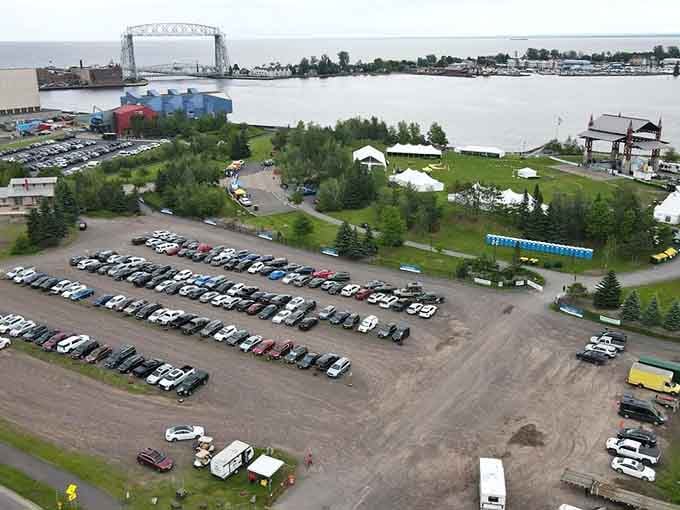 From above, the park's full scope reveals itself: playground, stage, green space, and endless Lake Superior.