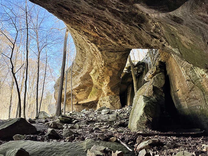 Rock overhangs create natural shelters that ancient peoples used, making your camping gear seem embarrassingly high-tech and unnecessary.