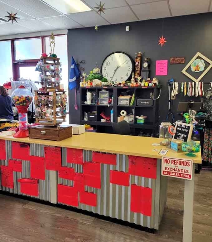 The checkout counter decorated with enough personality to make waiting in line almost enjoyable, almost.