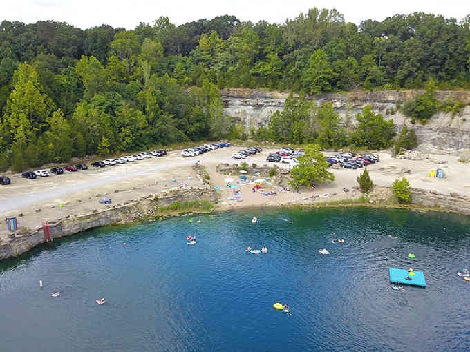 From above, the contrast between deep sapphire water and limestone shores creates an almost unbelievable masterpiece.