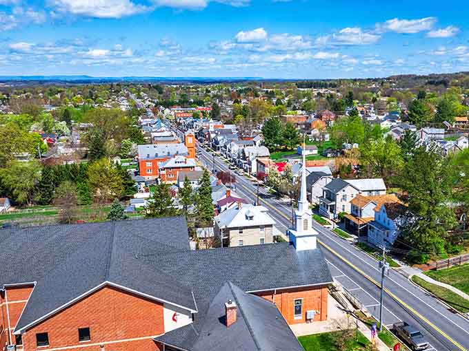 From above, the town reveals its true character: a ribbon of history stretching through the valley, connecting past and present beautifully.