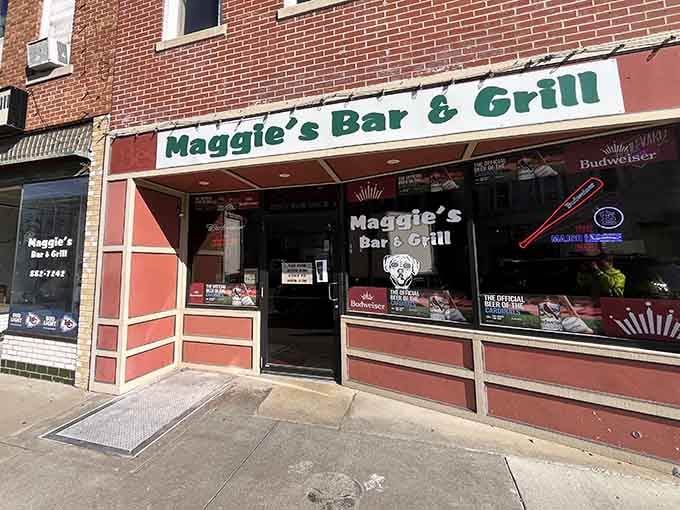 Maggie's Bar & Grill wears its neon signs like badges of honor, promising cold drinks and warm hospitality.