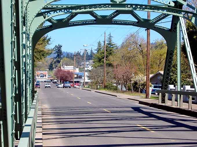 The historic bridge welcomes you to Brownsville like a portal connecting modern highways to a gentler era.