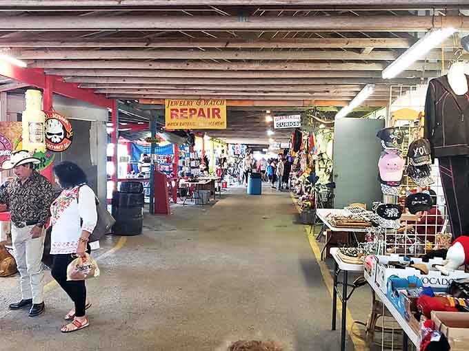 The jewelry repair sign proves this isn't just shopping&mdash;it's a full-service community hub where people actually help each other out.