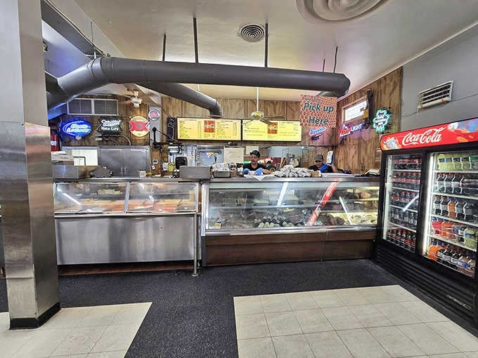 The deli counter where skilled hands transform simple ingredients into sandwiches that inspire genuine devotion and loyalty.