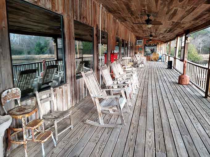 White rocking chairs line the porch for post-dinner relaxation under the Georgia sky.