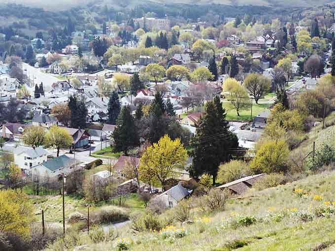 From above, the town nestles into its valley like it's always belonged there, perfectly at home.