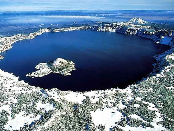 From above, the full majesty of this collapsed caldera reveals itself like nature's own aerial masterpiece.