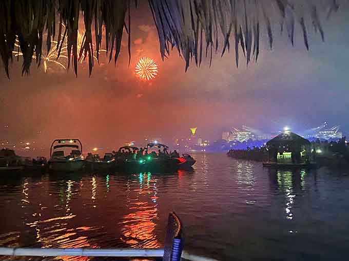 Fireworks from your floating tiki bar because apparently someone decided to make the perfect evening even more ridiculously spectacular.