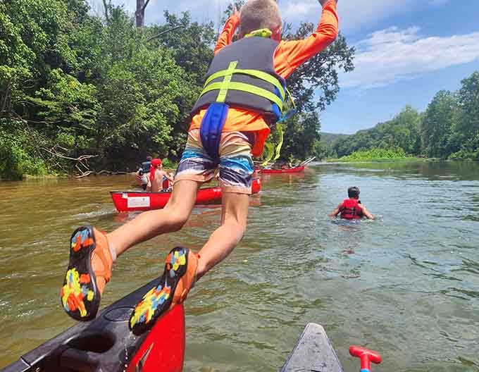 Mid-jump joy captures the pure freedom of a summer day on the Current River.
