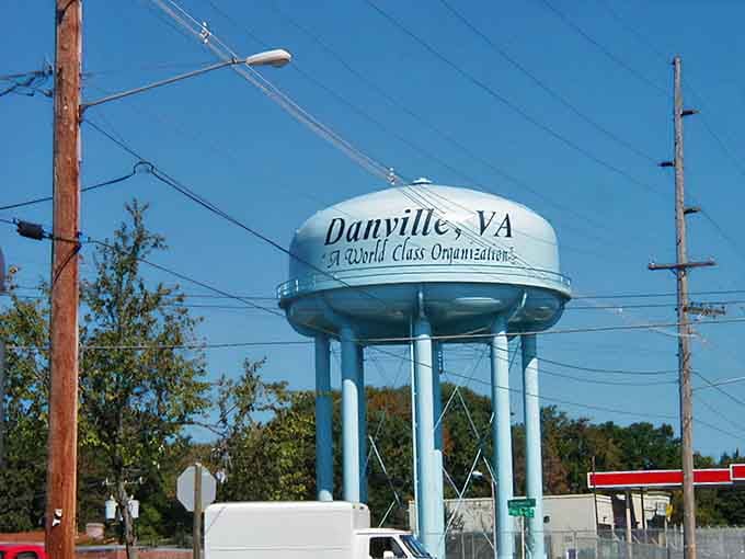 The water tower proudly declares Danville a "World Class Organization," and honestly, the confidence is kind of refreshing.