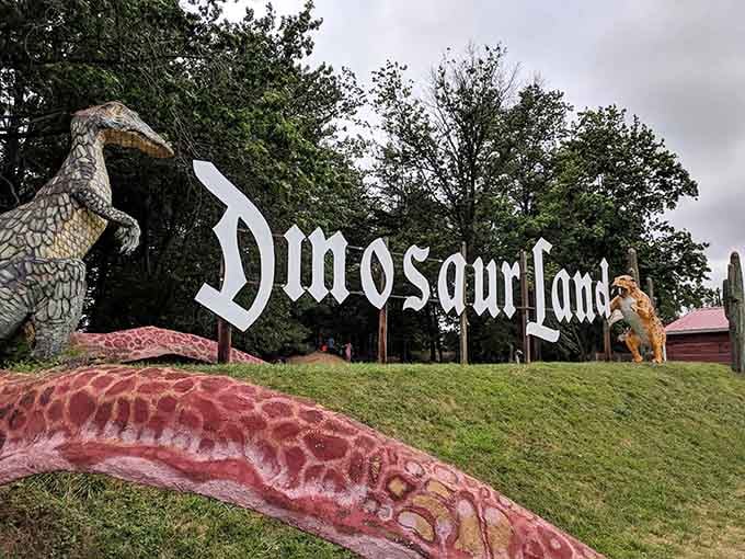 The classic Dinosaur Land sign welcomes visitors to an educational prehistoric forest that's delightfully light on actual education.