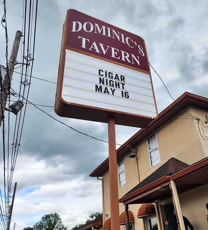 The classic marquee sign announces special events, standing proud like a beacon guiding hungry travelers to their wing-filled destination ahead.