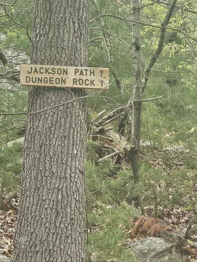The trail sign points the way to Dungeon Rock, because even legendary caves need decent directional signage.