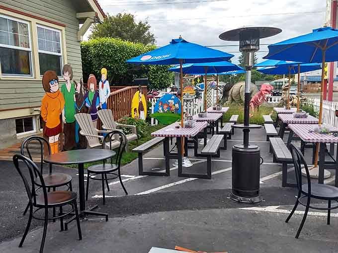 Scooby-Doo, dinosaurs, and patio heaters. This outdoor seating area is basically a theme park with better food.