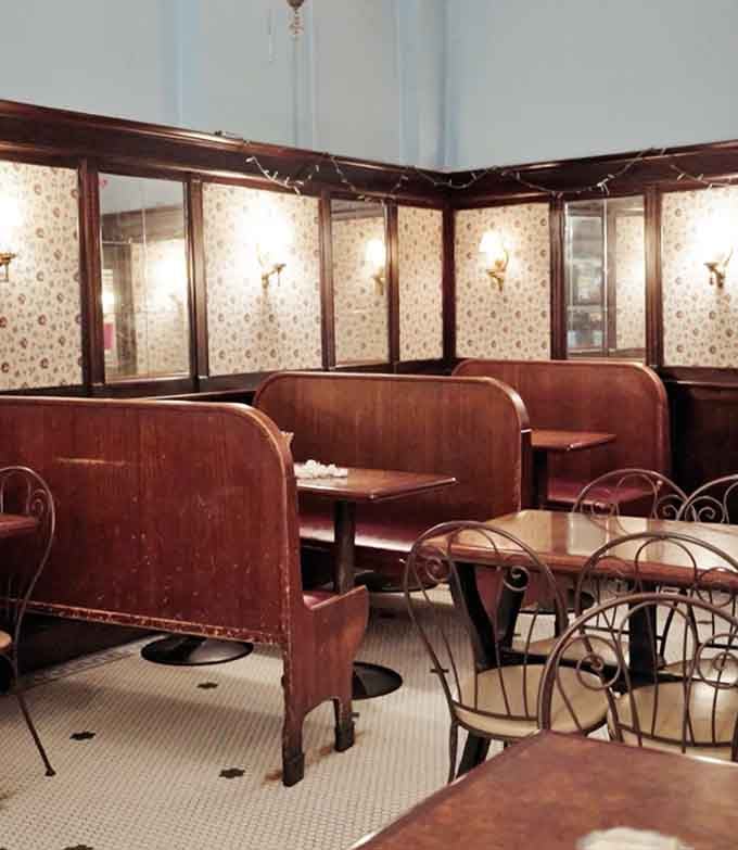 Those wooden booths have absorbed decades of laughter, first kisses, and the satisfied silence of perfect sundaes.