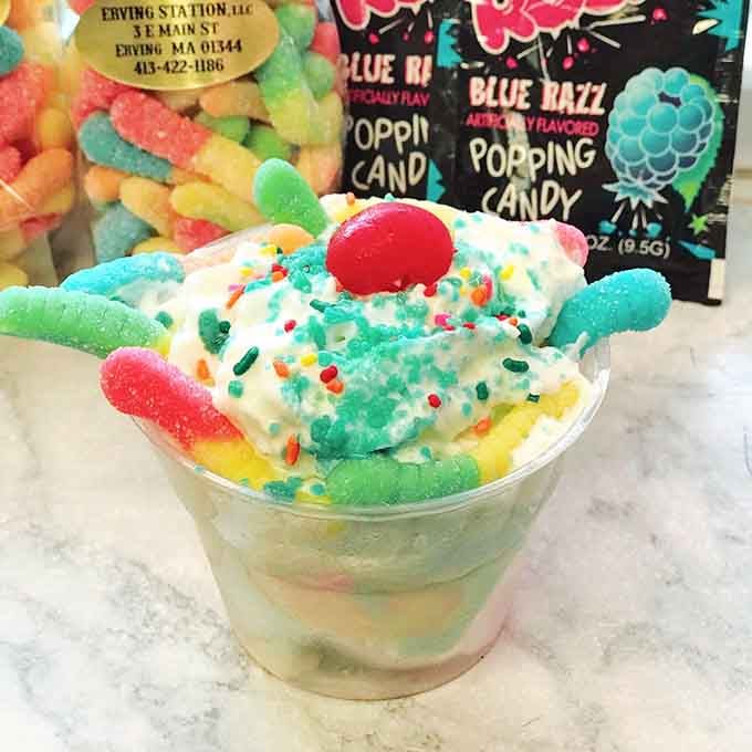 This Candy Craze Sundae looks like a sugar rush gained sentience, grew whipped cream hair, and achieved enlightenment.
