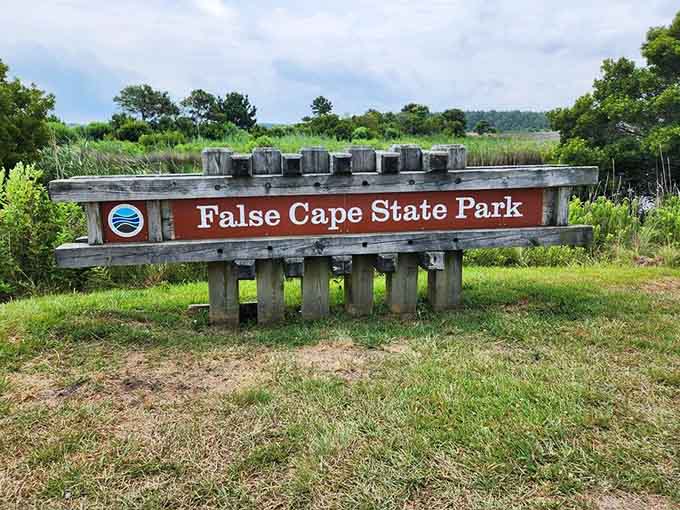 This sign marks the gateway to wilderness that demands respect, preparation, and functioning leg muscles.