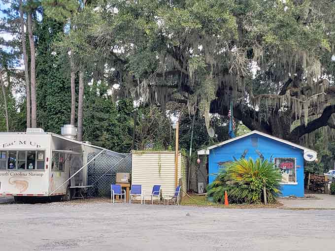 The whole setup, from blue building to food trailer, creates an authentic Lowcountry experience you won't forget soon.
