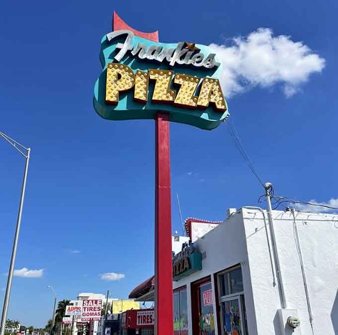 That retro sign against the blue sky is pure Americana, the kind that makes you smile before tasting anything.