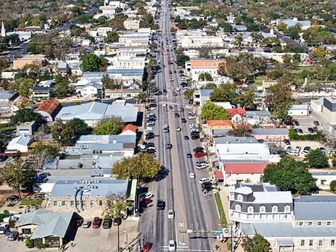 From above, Main Street cuts through Fredericksburg like a timeline of Texas history you can actually walk and shop.