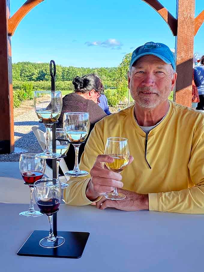 His smile says it all: good wine, great views, and a flight of favorites lined up like old friends.