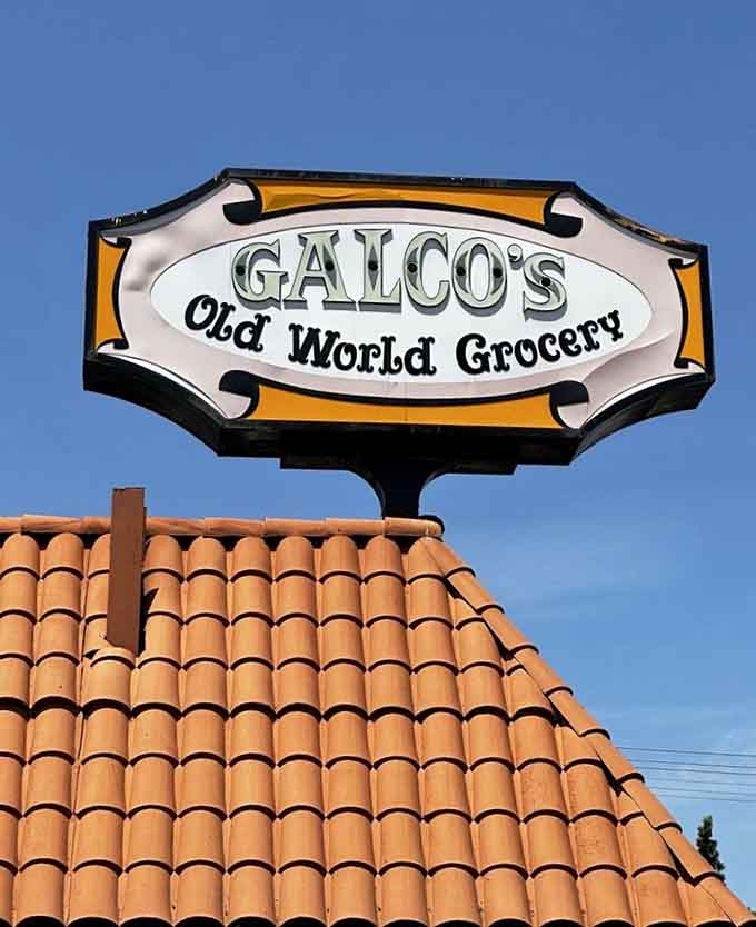 That vintage sign against terra cotta tiles screams classic California charm, welcoming you to something genuinely special inside.