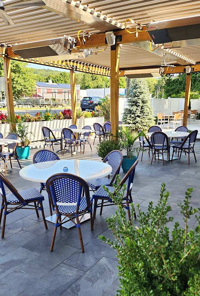 Outdoor seating under the pergola transforms a regular meal into a mini vacation right here in Connecticut.