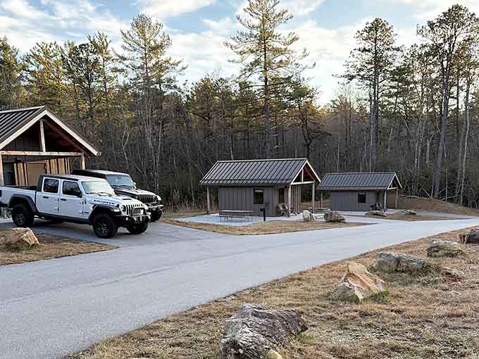 The parking area and facilities, proving that even wilderness adventures need a proper starting point with restrooms.