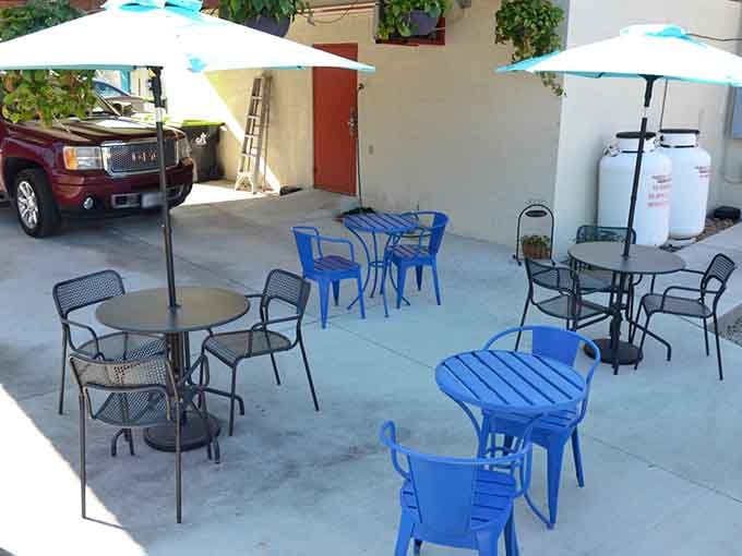 Outdoor patio seating under bright umbrellas provides the perfect spot for warm-weather seafood feasting.