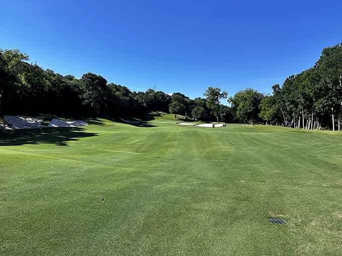 Cowboys Golf Club's manicured fairways stretch toward tree-lined horizons, calling golfers to test their swing and patience.