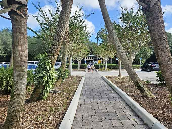 The parking area and walkway invite you in, where the only admission fee is your willingness to slow down.