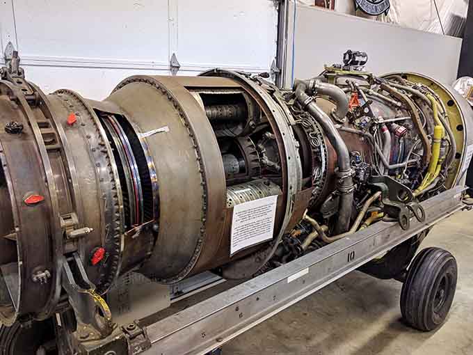 A cutaway jet engine showing the beautiful complexity that makes tons of metal defy gravity.