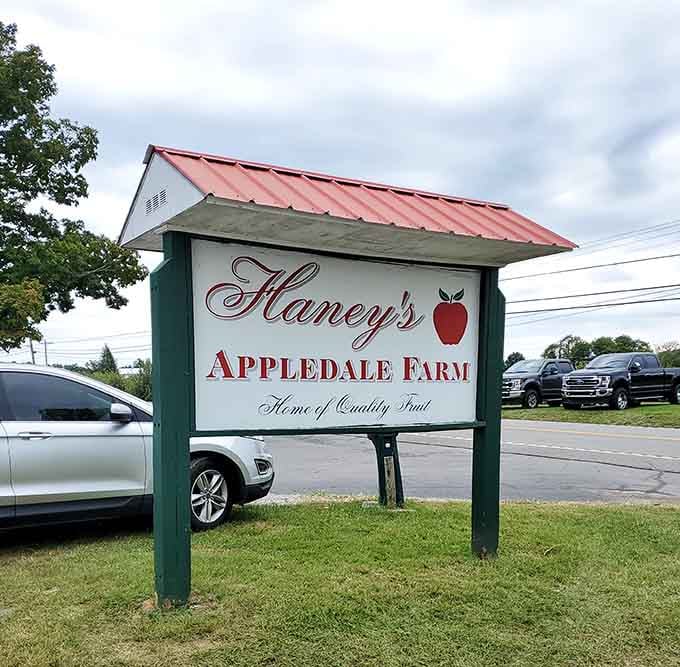 The "Home of Quality Fruit" sign isn't just marketing, it's a promise this farm has been keeping for every single visitor who stops by.