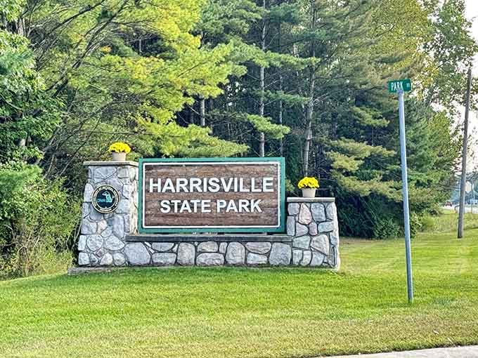 The welcome sign promises adventures ahead, marking the entrance to your new favorite Michigan getaway spot.