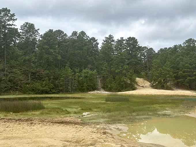 When water levels drop, the sandy bottom creates shallow pools that glow like liquid jade.