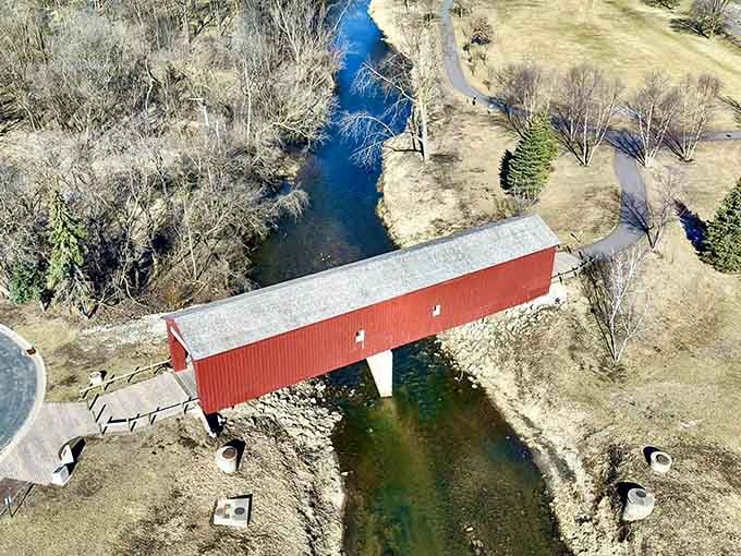 From above, the bridge stretches across the landscape like a red ribbon connecting past to present perfectly.