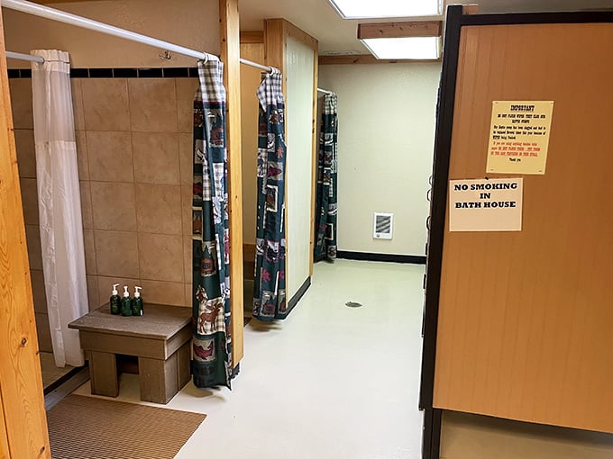 Clean, modern bathhouse facilities prove you can have pioneer vibes without pioneer hygiene standards.
