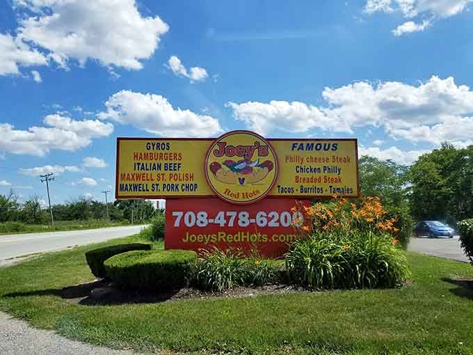 That roadside sign listing gyros, burgers, and Italian beef is basically a love letter to anyone driving by with an empty stomach.