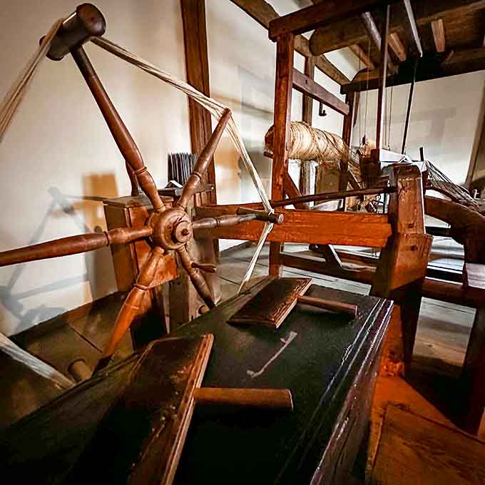 This spinning wheel and loom turned raw fiber into cloth through hours of repetitive labor we'd never tolerate.