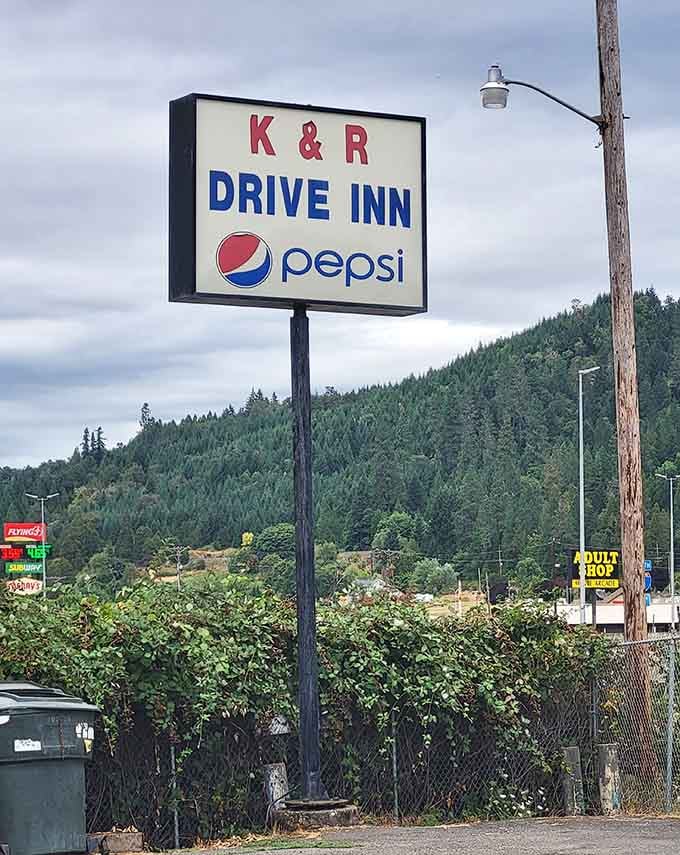 The K & R sign standing proud against the mountains, a beacon for anyone craving authentic drive-in food.