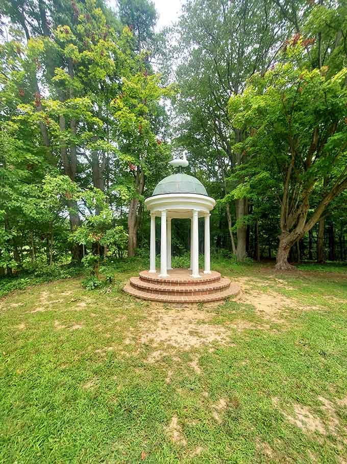 A classical gazebo that's basically begging you to sit down, relax, and pretend you're in a period drama.