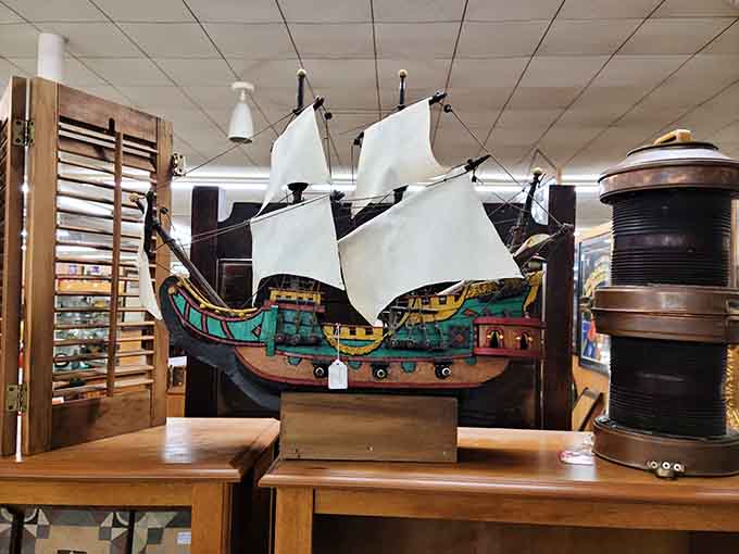 This majestic model ship sailed imaginary seas from someone's mantel, a testament to patience and meticulous hand-painted craftsmanship.